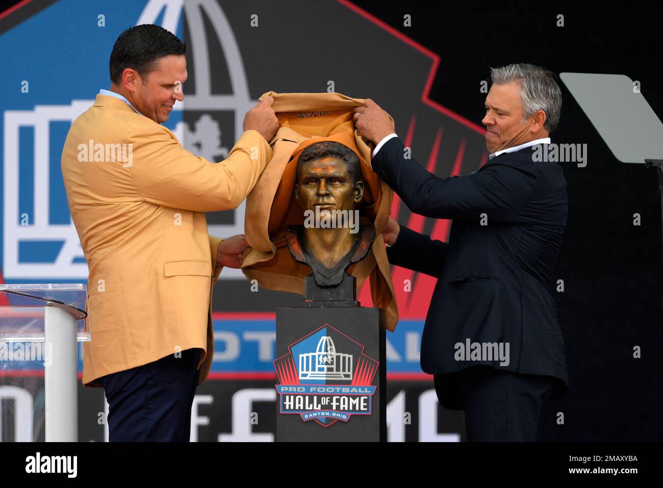 Former NFL player Tony Boselli, left, and his presenter Mar Brunell ...