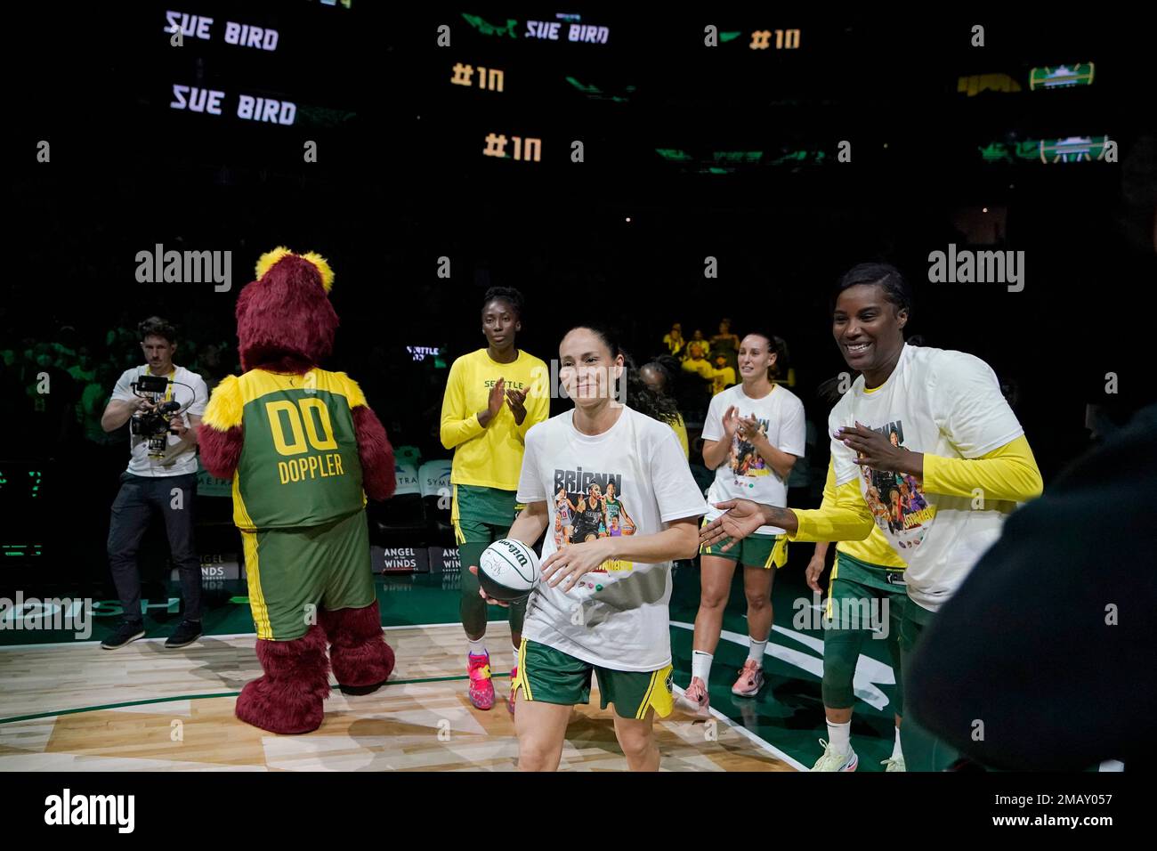 Seattle Storm guard Sue Bird, center, is introduced at the start of a ...