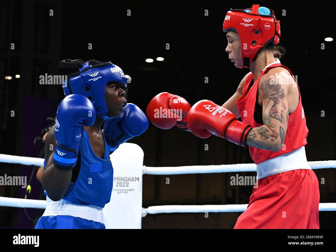 Northern Ireland's Carly Mc Naul, right, and Uganda's Teddy Nakimuli ...