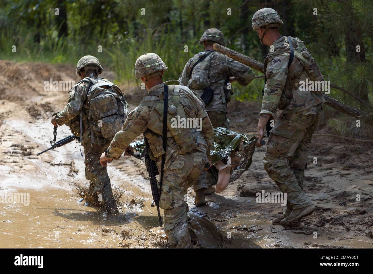 Soldiers assigned to the 16th Military Police Brigade perform a litter ...