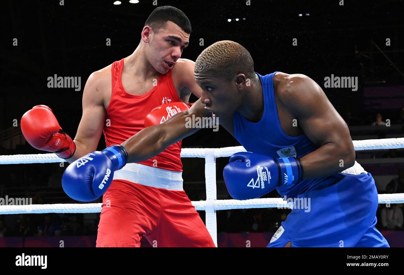 Australia's Callum Peters, left, and South Africa's Simnikiwe Bongco ...