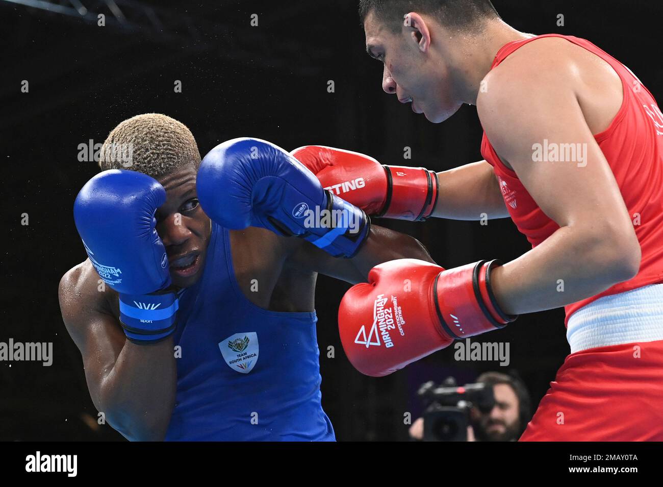 Australia's Callum Peters, right, and South Africa's Simnikiwe Bongco ...