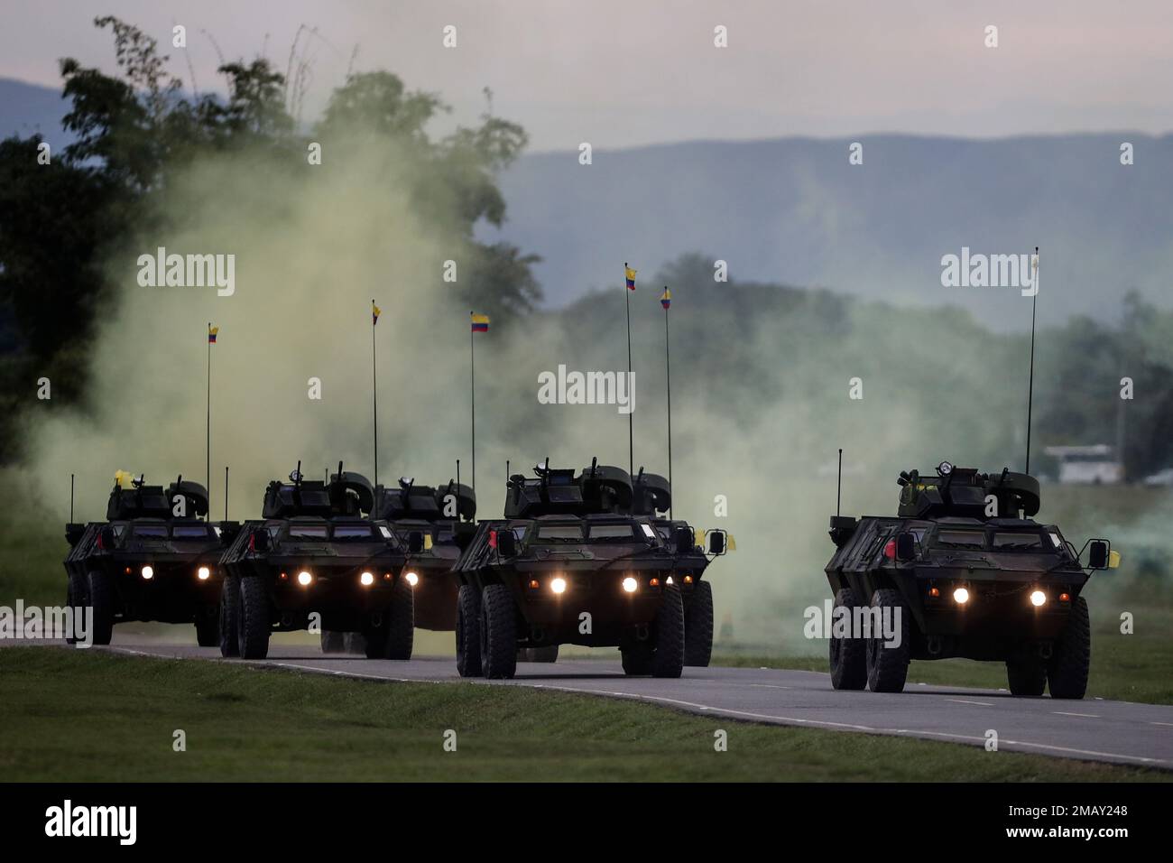 Armored vehicles parade during a military ceremony marking the army's ...