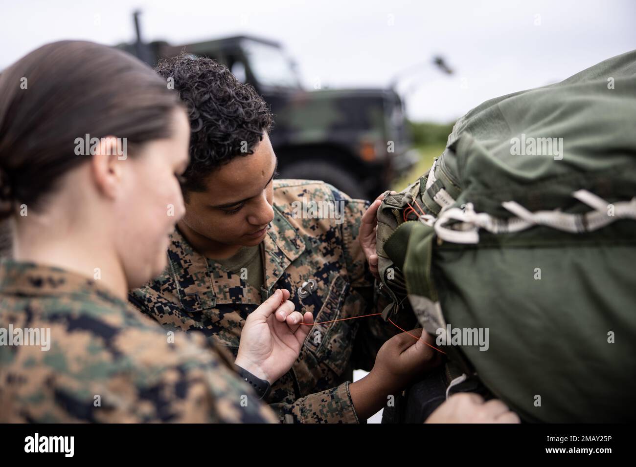 U.S. Marine Corps Pfc. Stephanie Caves, left, and Lance Cpl. Chandra ...