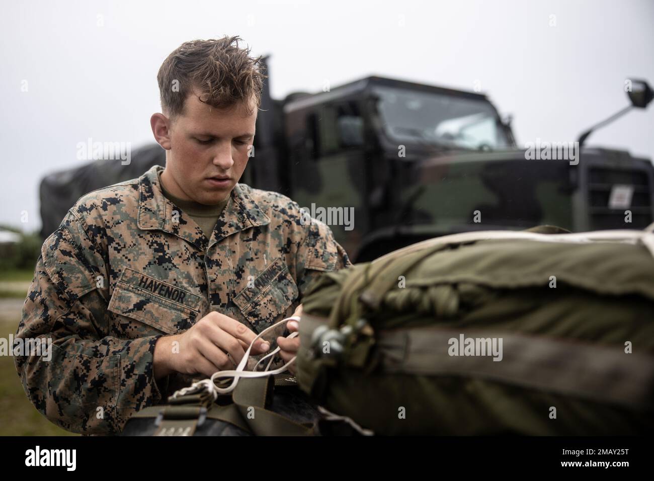 U.S. Marine Corps Lance Cpl. Johnathon Havenor, a parachute rigger with ...
