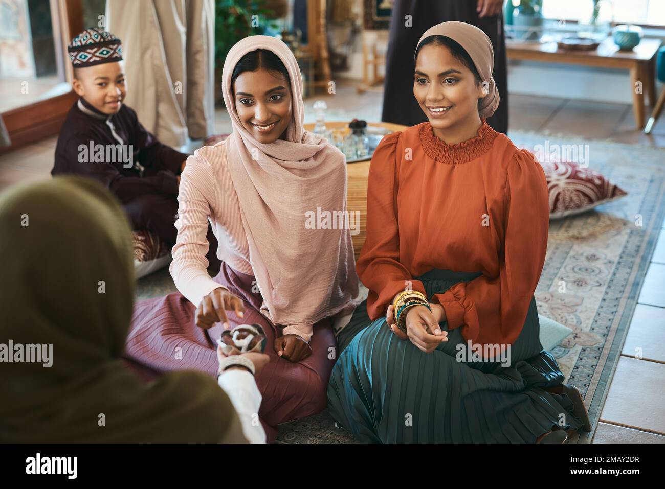 Thank you for these dates. a group of muslim women relaxing together ...
