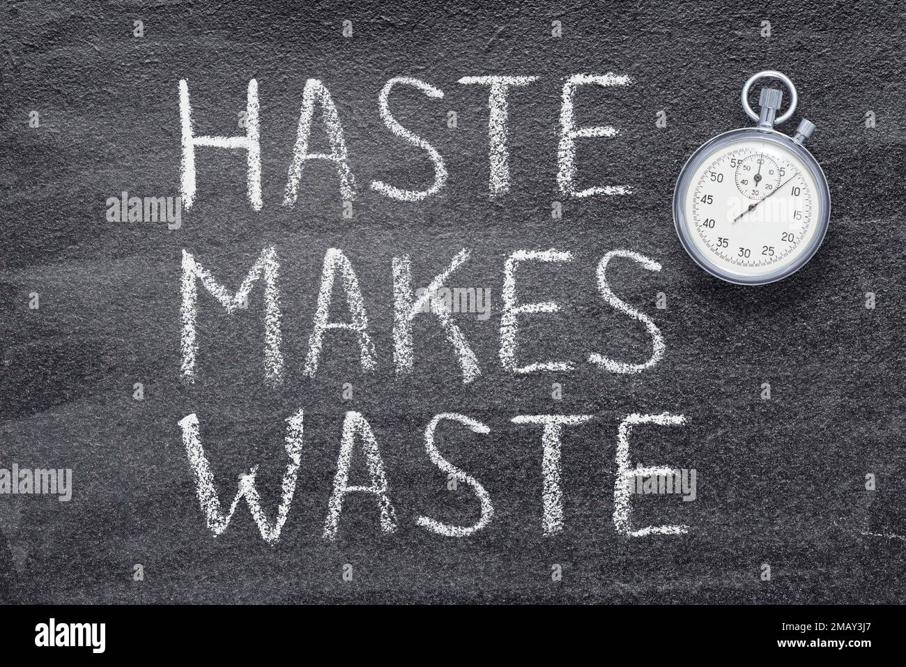 haste makes waste phrase written on chalkboard with vintage precise ...