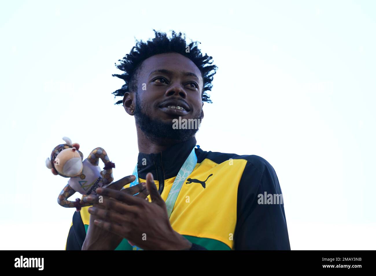 Rasheed Broadbell of Jamaica stands on the podium after winning the ...