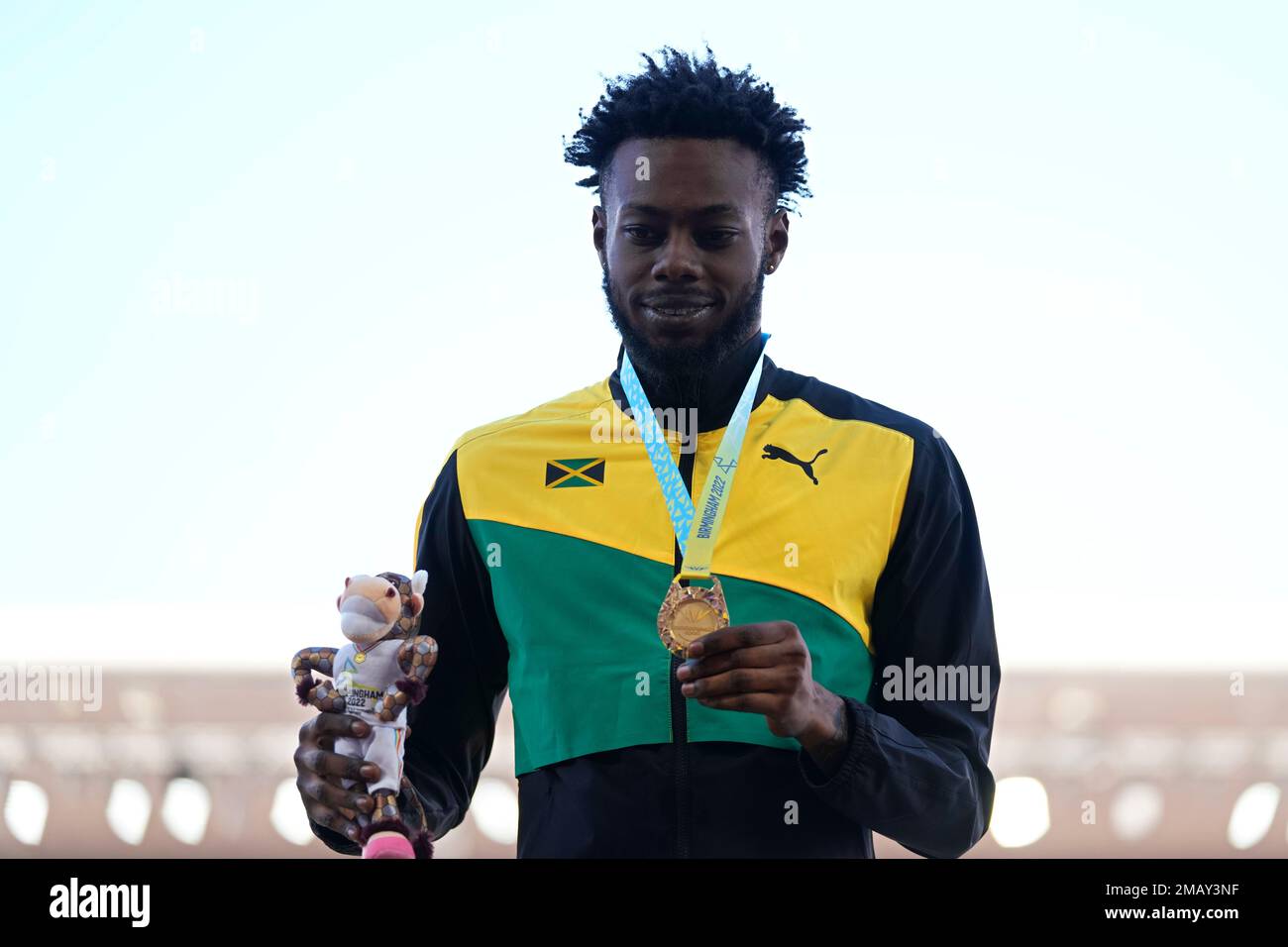 Rasheed Broadbell of Jamaica stands on the podium after winning the ...