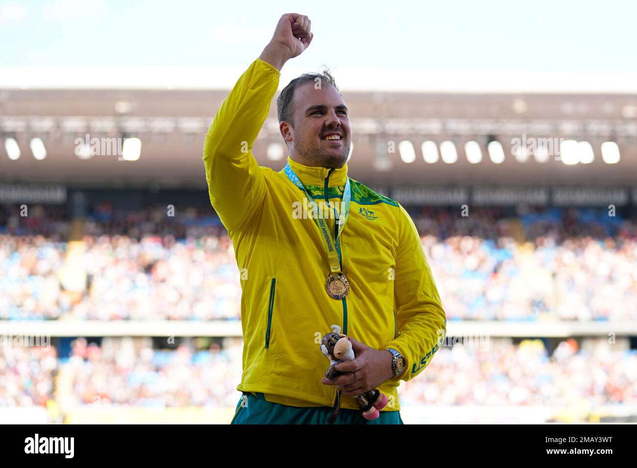 Matthew Denny of Australia gestures on the podium after winning the ...
