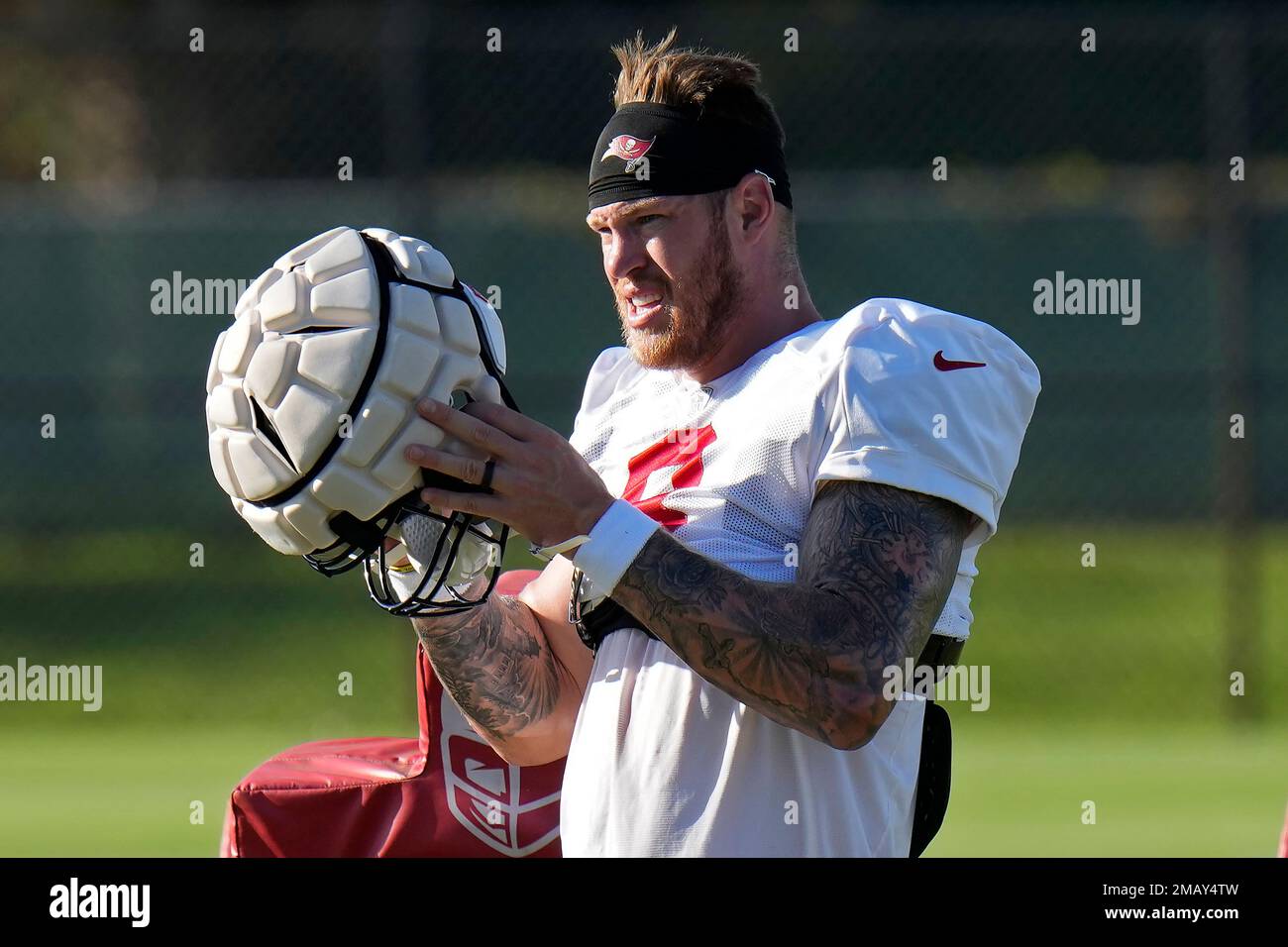 Tampa Bay Buccaneers tight end Kyle Rudolph puts on his helmet before ...