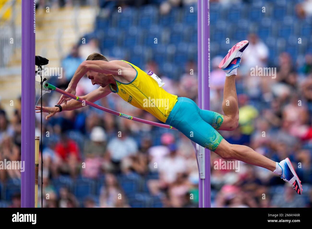 Cedric Dubler of Australia competes in the decathlon pole vault during ...