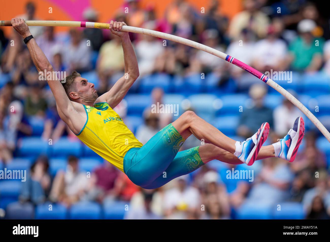 Cedric Dubler of Australia competes in the decathlon pole vault during ...