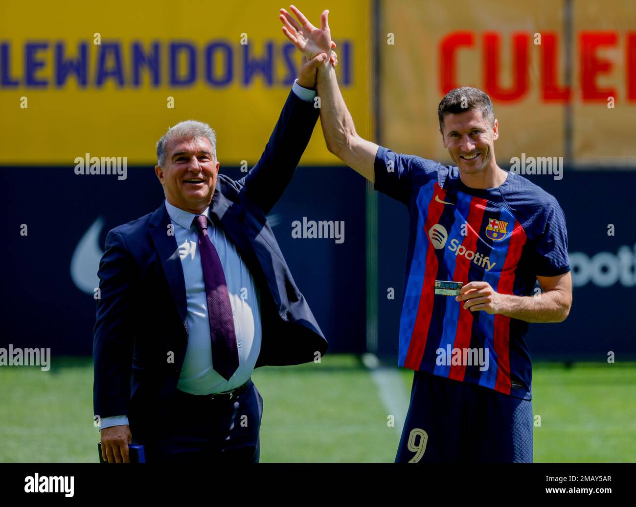 Polish forward Robert Lewandowski, right, and FC Barcelona President ...