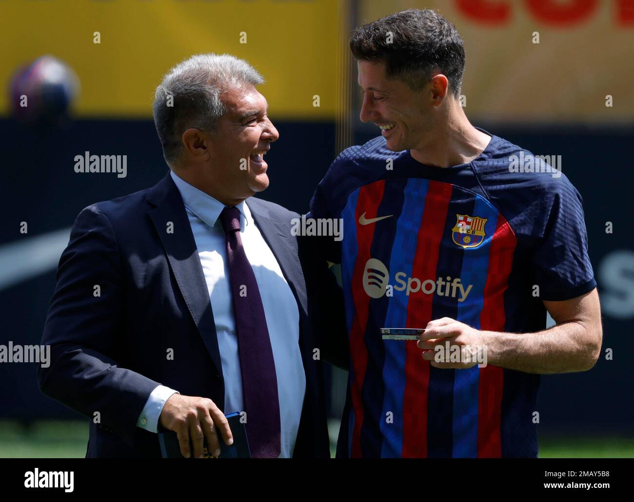 Polish forward Robert Lewandowski, right, and FC Barcelona president ...