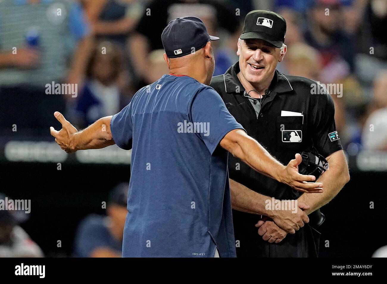 Boston Red Sox manager Alex Cora argues a call with home plate umpire ...