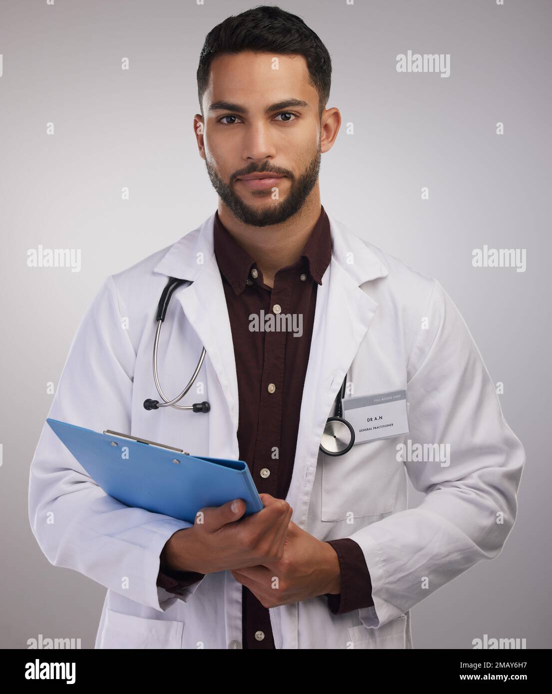 What do you do I save lives. a handsome young doctor standing alone in ...