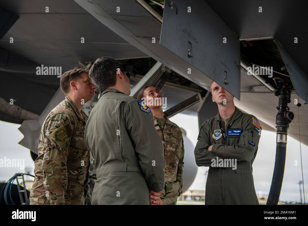 U.S. Air Force Airmen from the 18th Logistics Readiness Squadron work alongside Airmen from ...