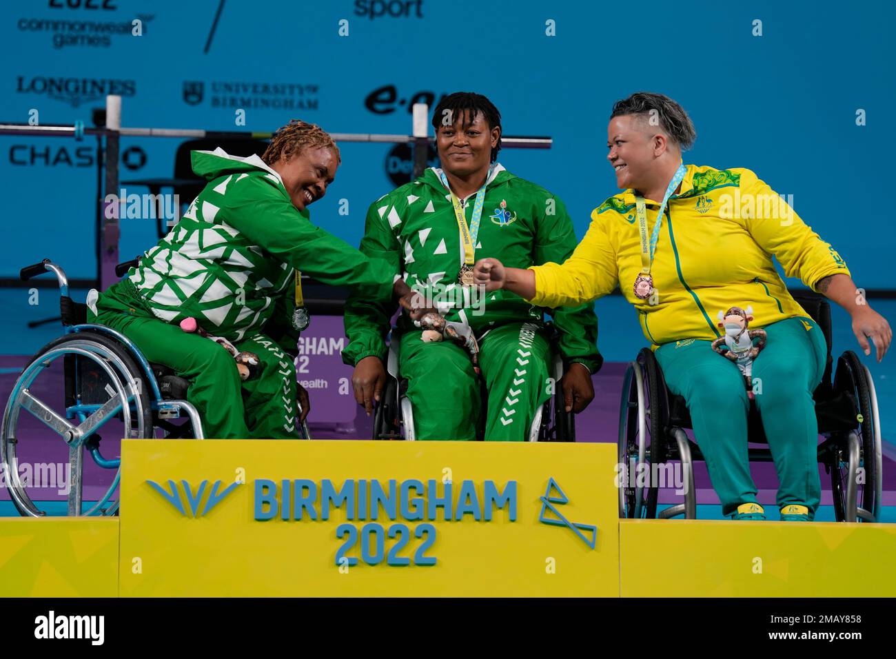 Nigeria's Alice Oluwafemiayo, center, Nigeria's Bose Omolayo, left, and ...