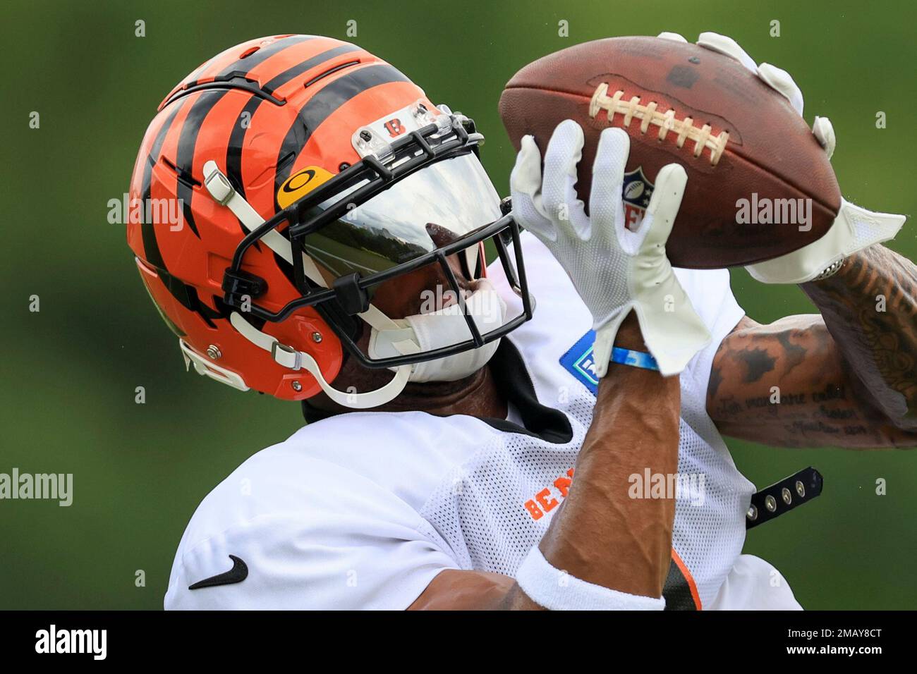 Cincinnati Bengals' Ja'Marr Chase makes a catch as he participates in a ...