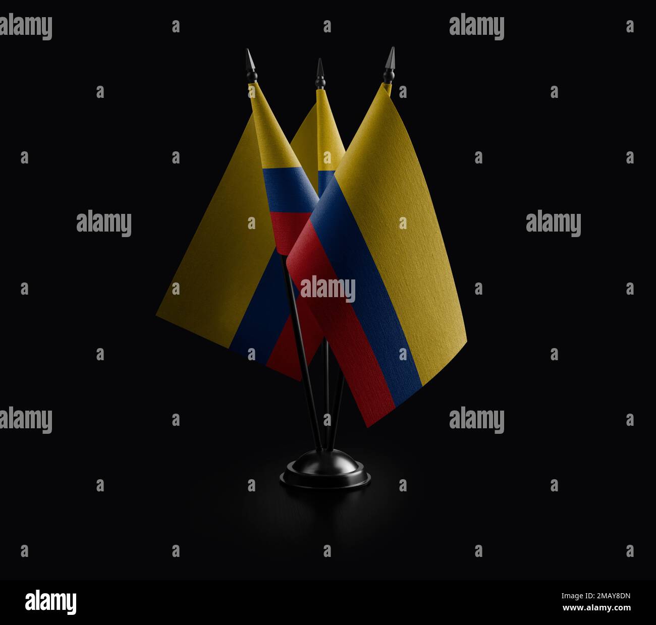 Small national flags of the Colombia on a black background Stock Photo ...
