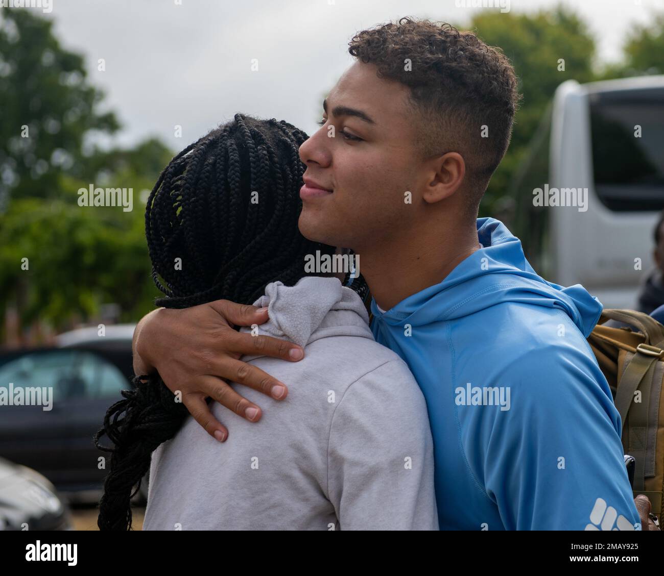 U.S. Air Force Airmen assigned to the 48th Security Forces Squadron hug ...