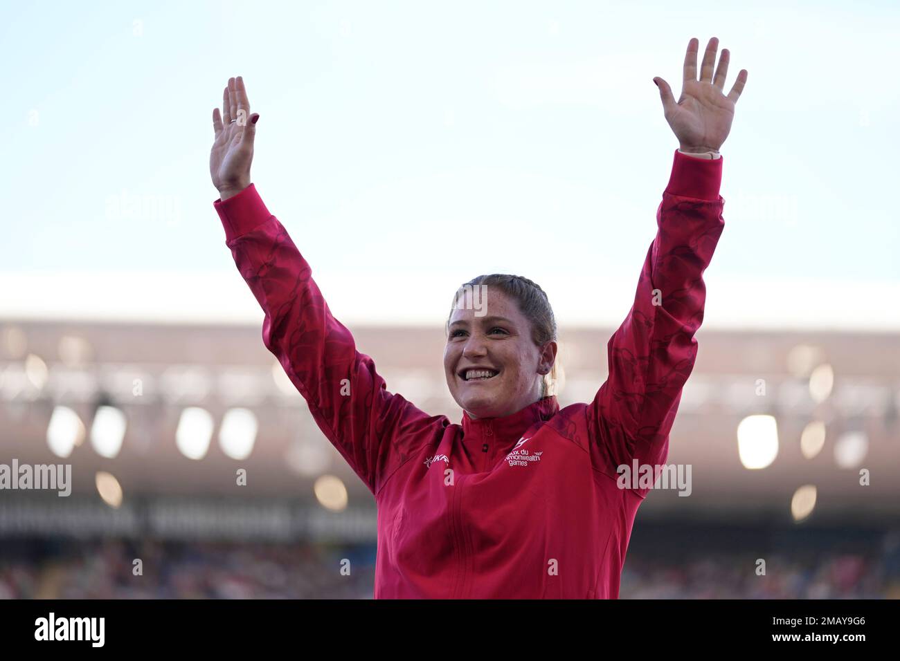 Sarah Mitton of Canada waves from the podium after winning the gold ...