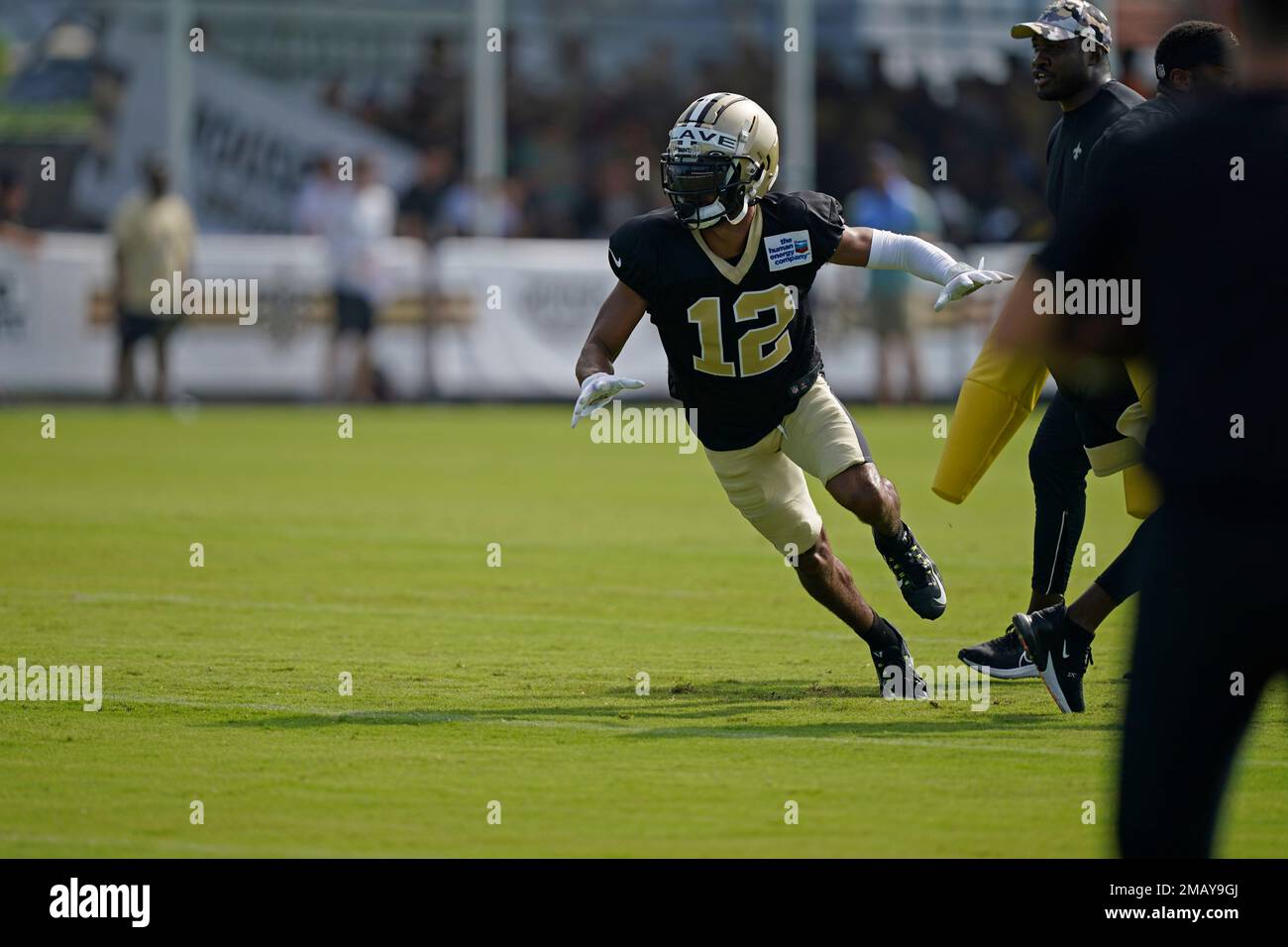 New Orleans Saints wide receiver Chris Olave (12) runs through drills during training camp at ...