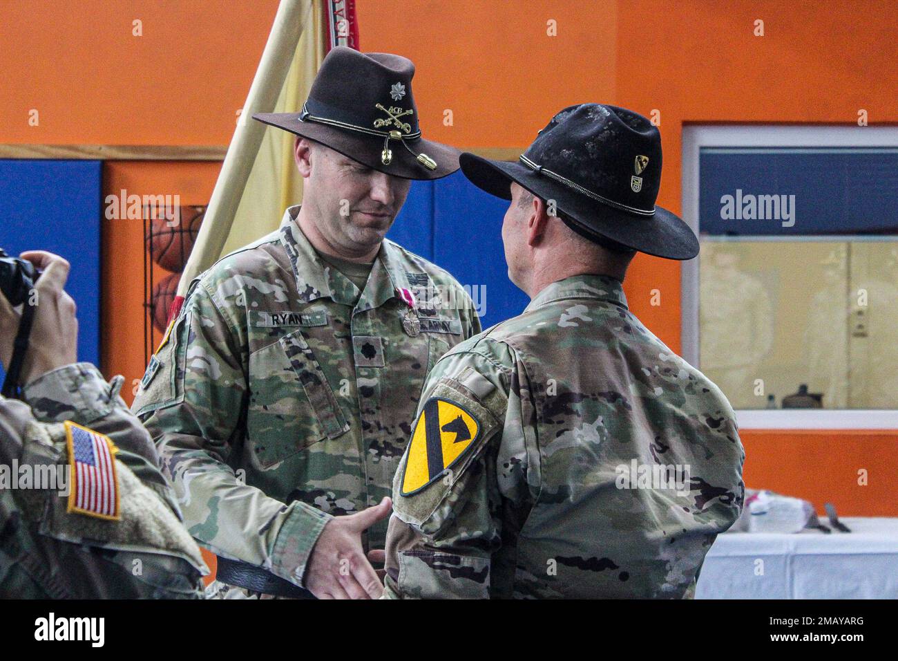 1st Air Cavalry Brigade commander, Col. Reggie Harper, congratulates ...