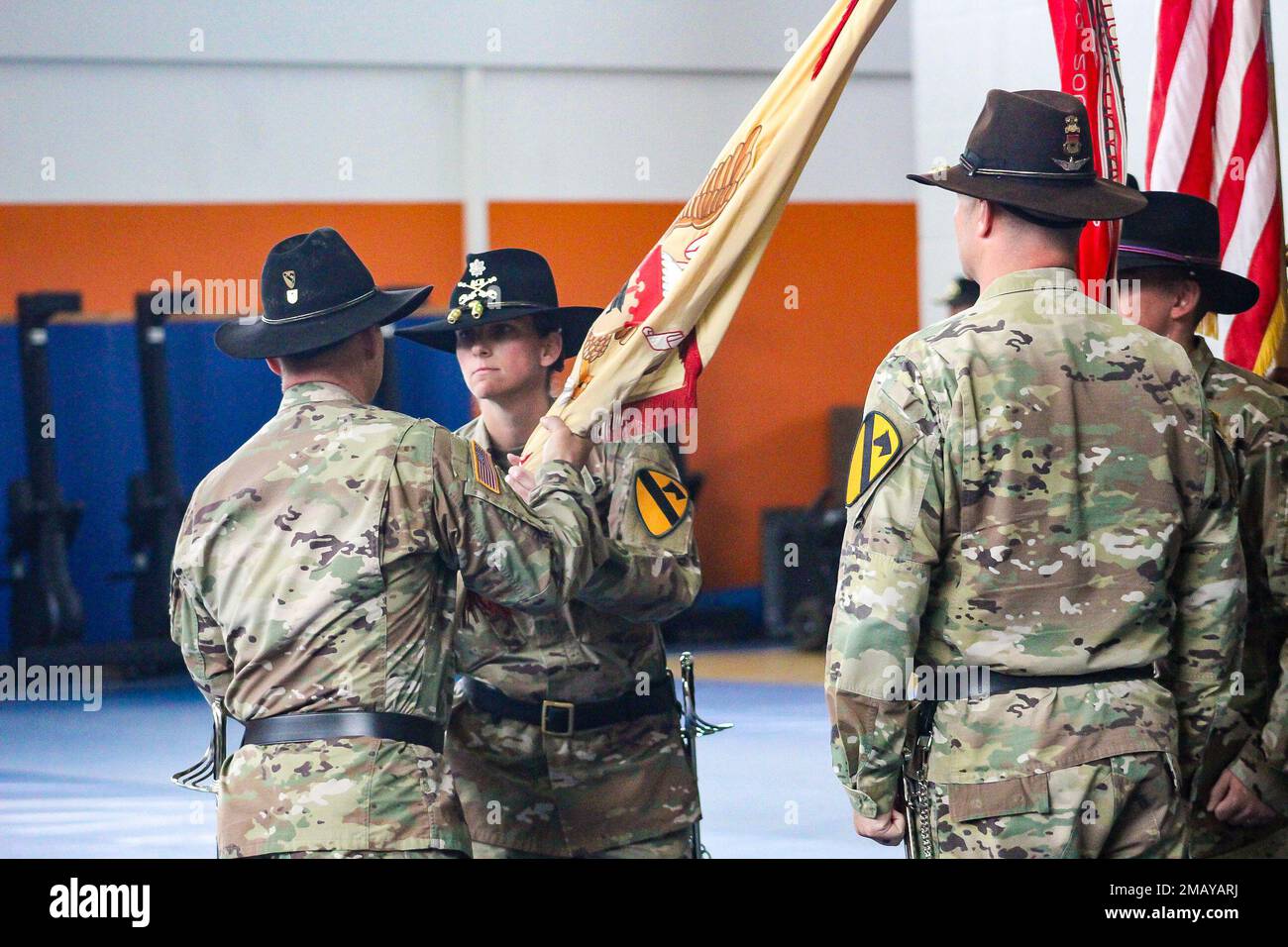 Col. Reggie Harper passes the 615th ASB colors to incoming commander ...