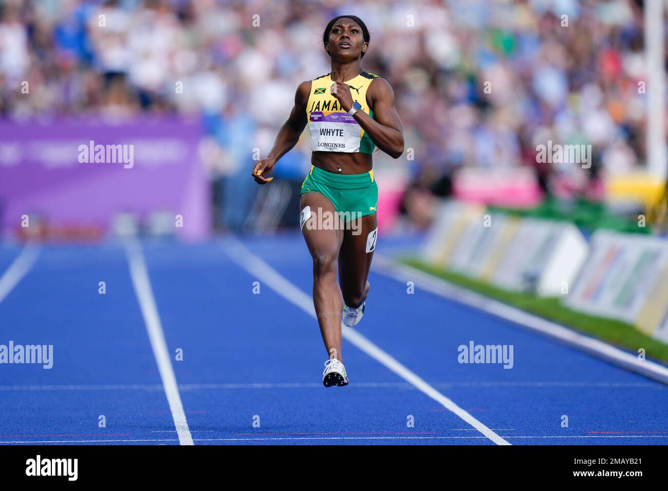 Natalliah Whyte of Jamaica races in her heat of the women's 200 meters ...
