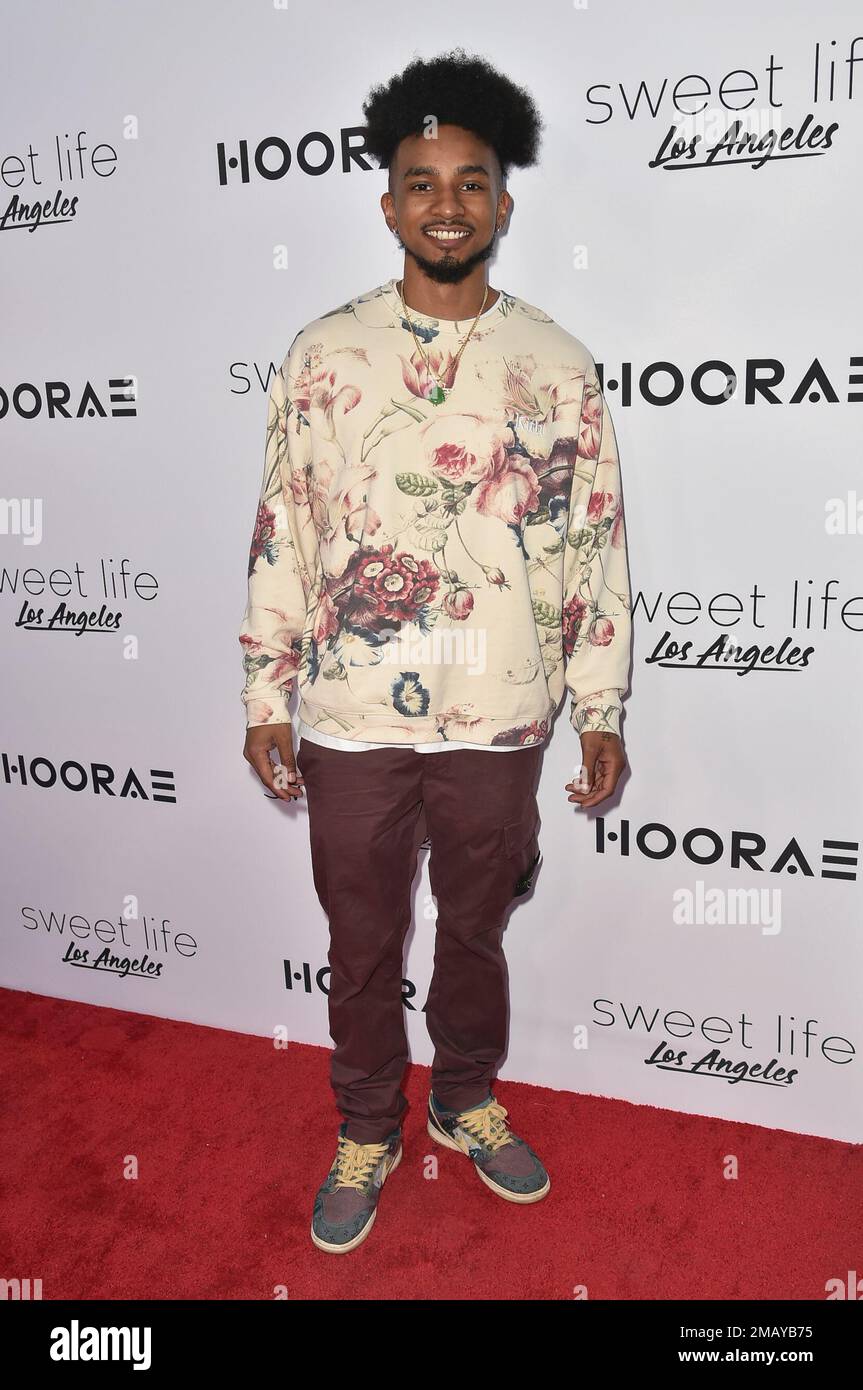 Kofi Jones arrives at the season two premiere of "Sweet Life: Los ...
