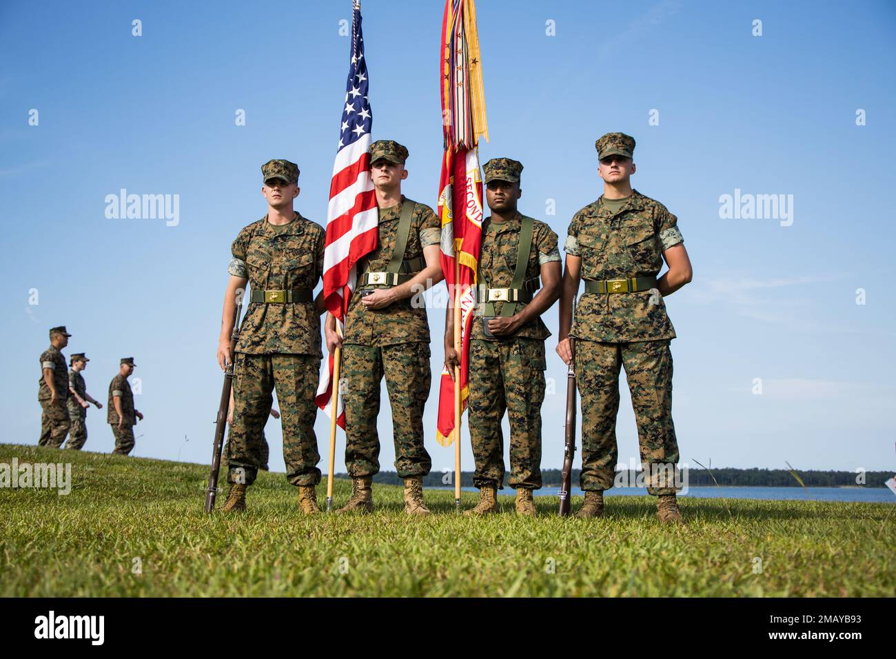 A U.S. Marine Corps color guard from 2nd Marine Logistics Group stands ...