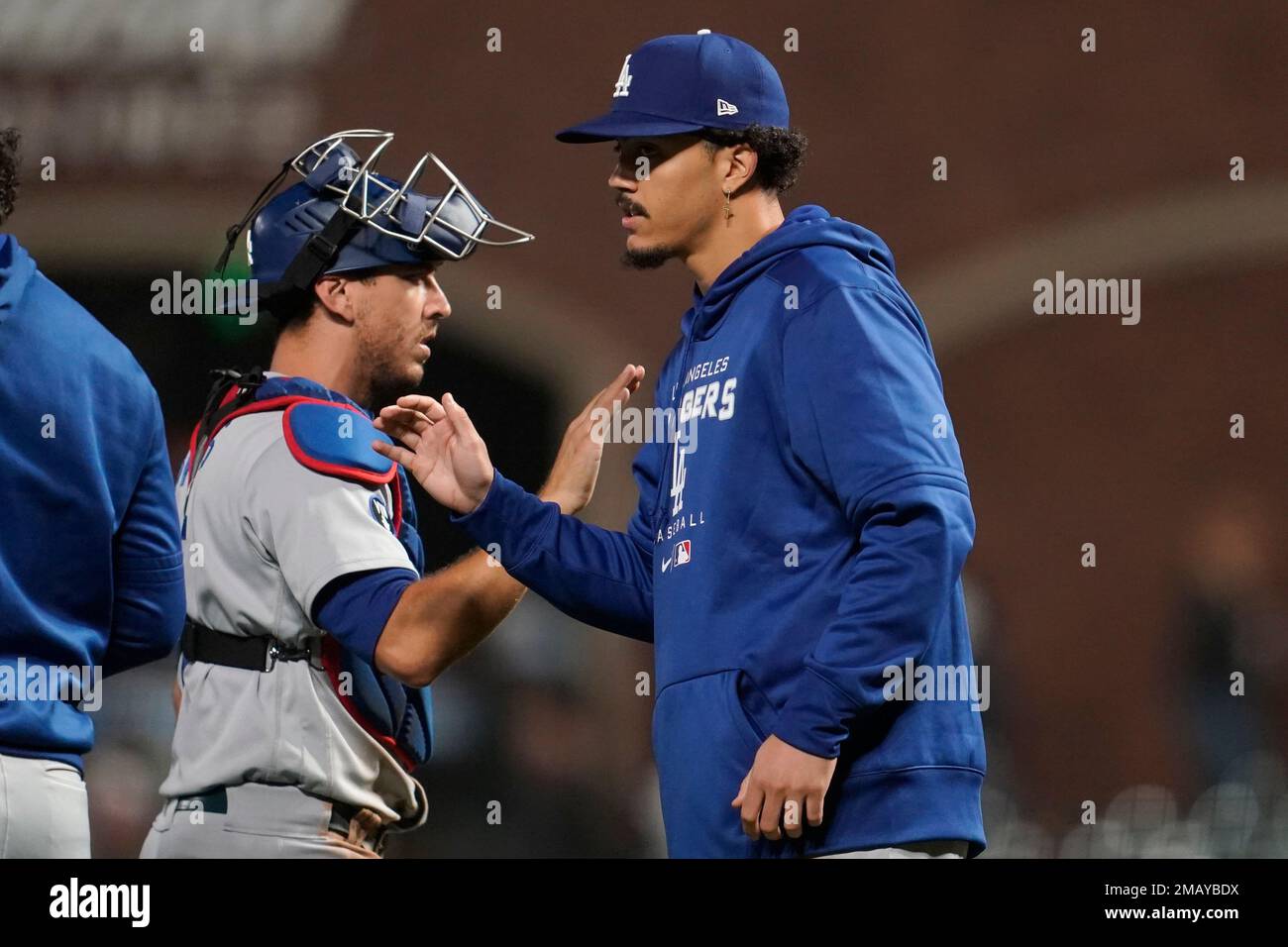 Los Angeles Dodgers' Austin Barnes, left, celebrates with Miguel Vargas ...