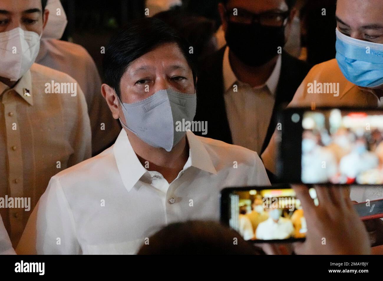 Philippine President Ferdinand Marcos Jr., talks to reporters after ...