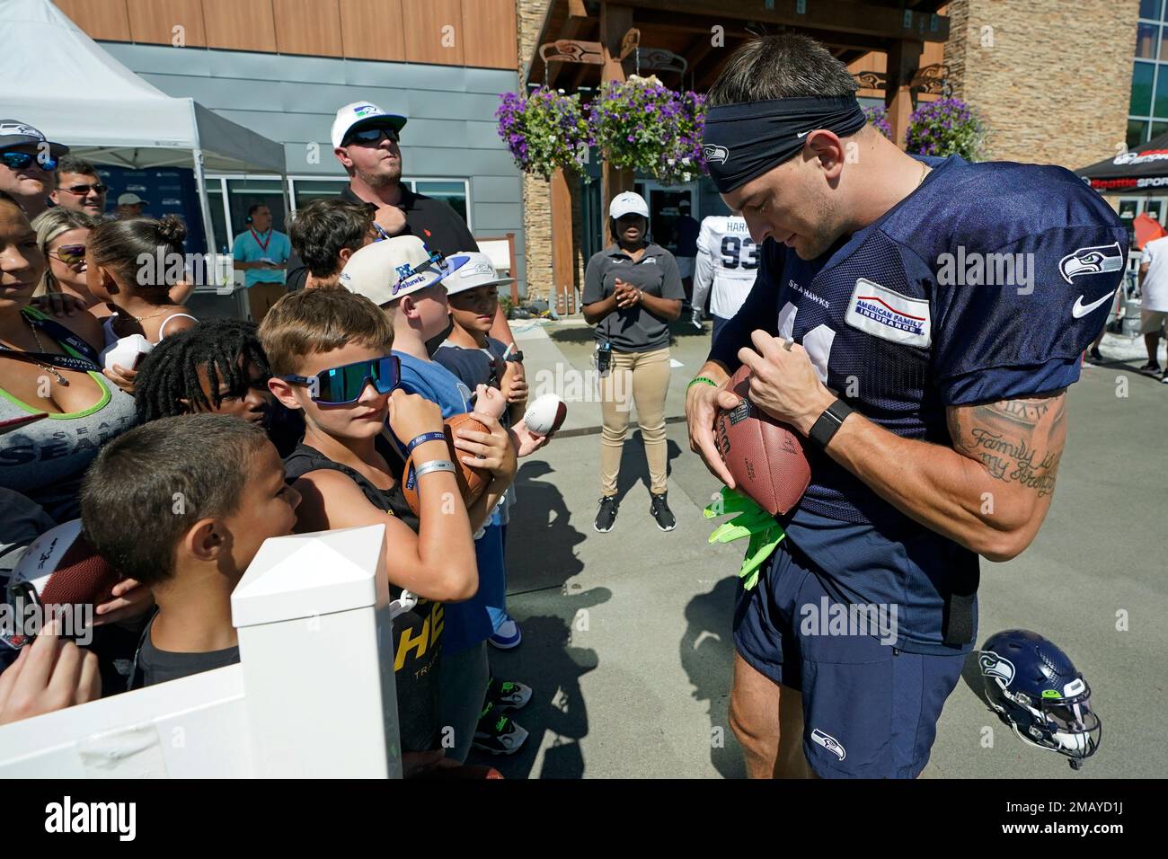 Seattle Seahawks wide receiver Cody Thompson signs autographs for fans ...