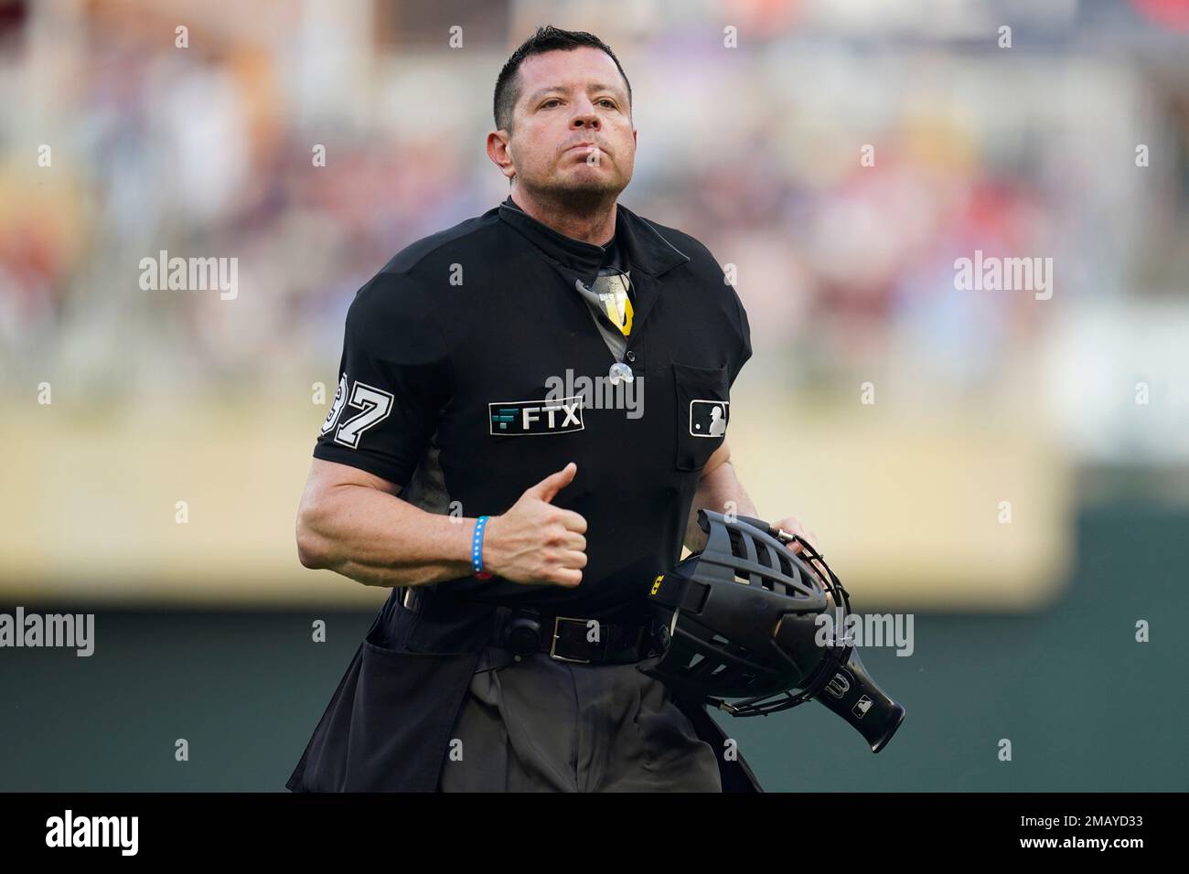 Home plate umpire Carlos Torres looks on during a game between the ...