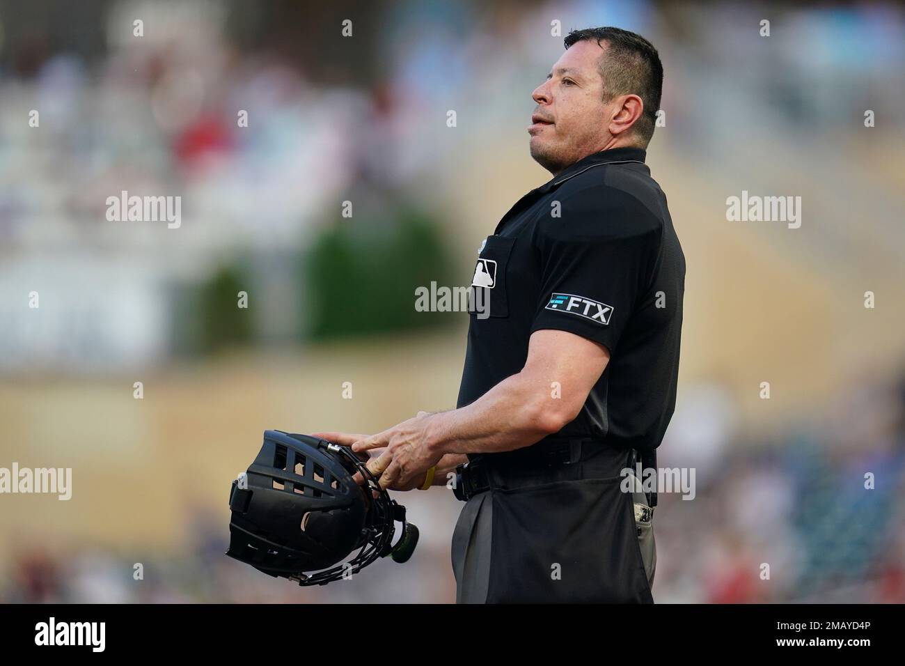 Home plate umpire Carlos Torres looks on during of a baseball game ...