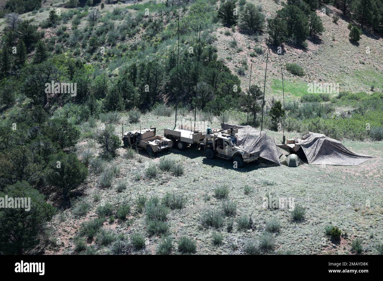 Aerial views of camp sights set up by the 4th Infantry Division stand ...