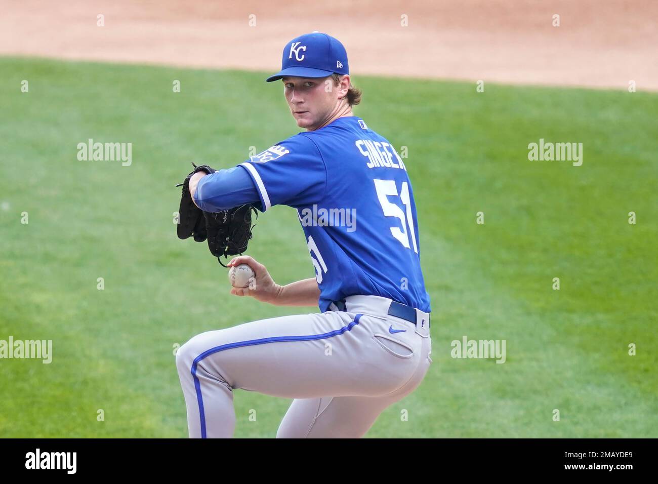 Kansas City Royals starting pitcher Brady Singer winds up during the ...