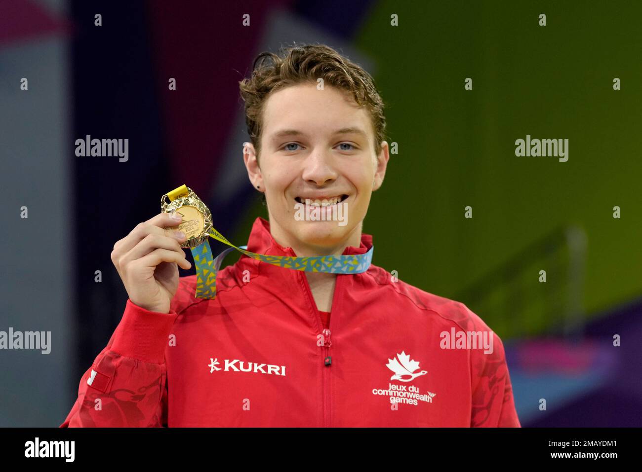 Nicholas Bennett of Canada poses after winning the gold medal in the ...