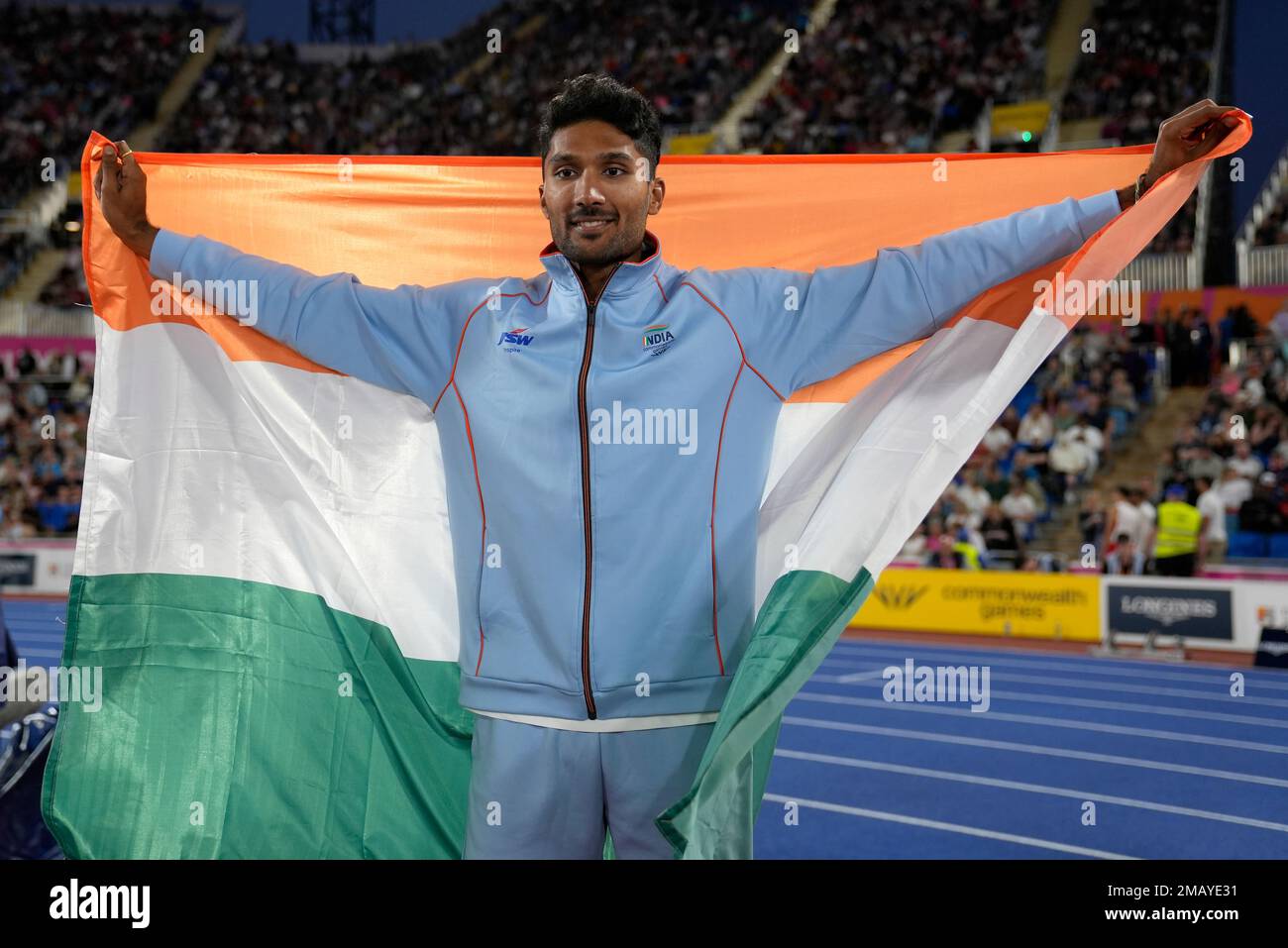India's Tejaswin Shankar celebrates after taking the bronze medal in ...