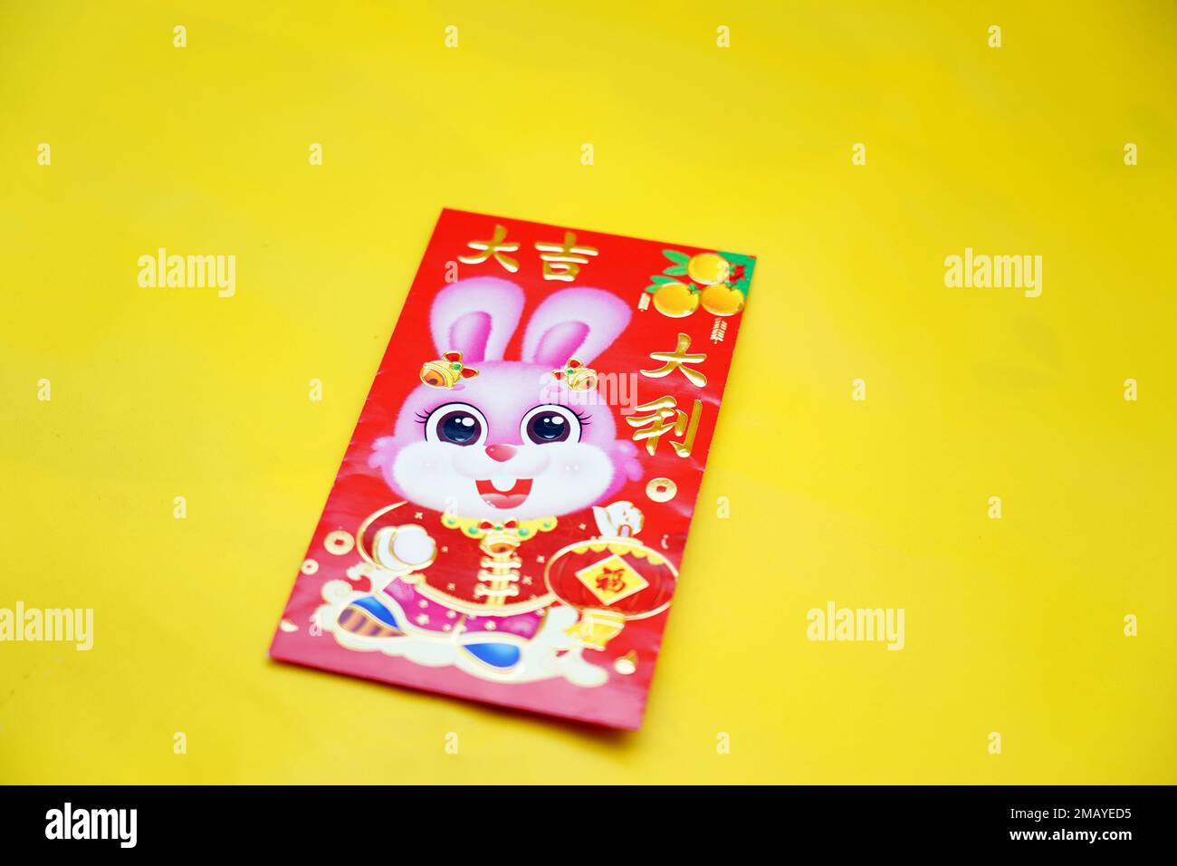 Theme red envelopes with rabbit, Chinese blessing words on yellow ...