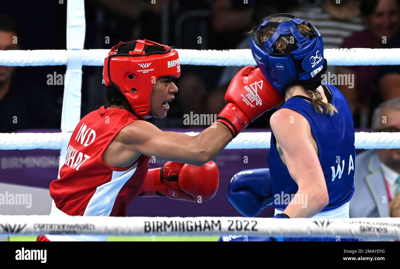 India's Zareen Nikhat, left, and Wales Helen Jones in action during the ...