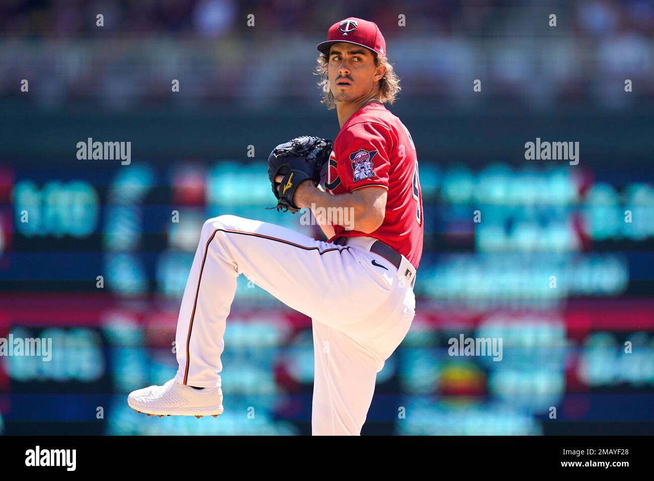 Minnesota Twins starting pitcher Joe Ryan winds up to deliver against ...