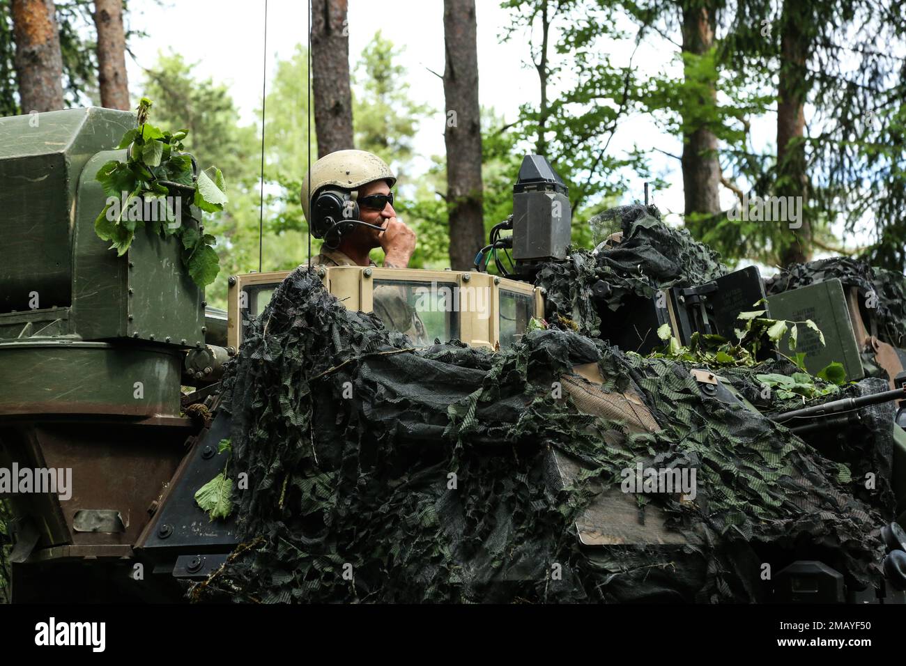 A U.S. Soldier assigned to Apache Company, 5-7 Cavalry observes to ...