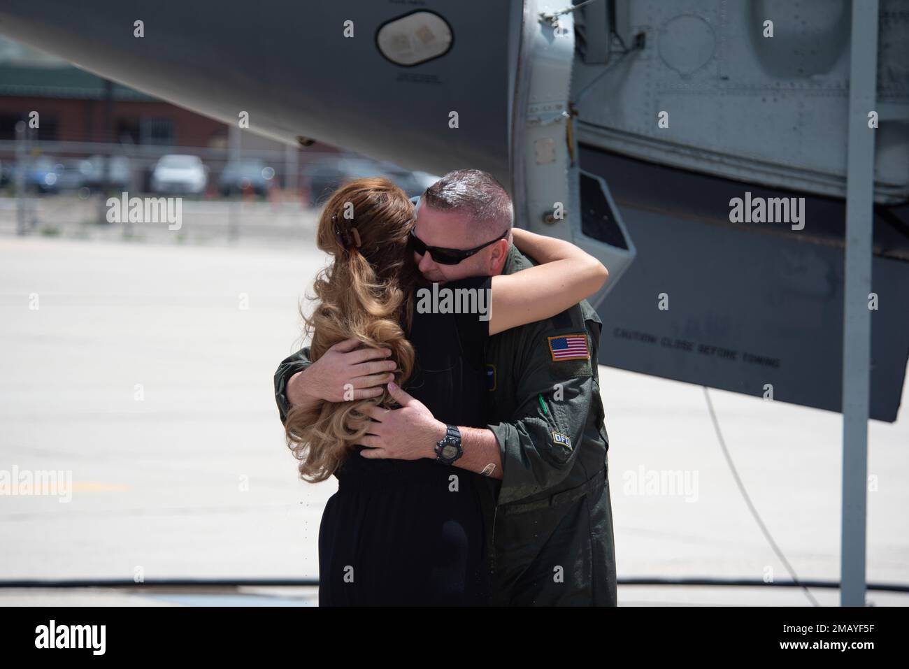 Air Force Lt Col Dan Hale embraces his wife after his fini-flight at ...