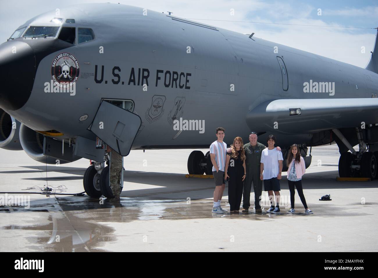 Air Force Lt Col Dan Hale poses with his family after his fini-flight ...