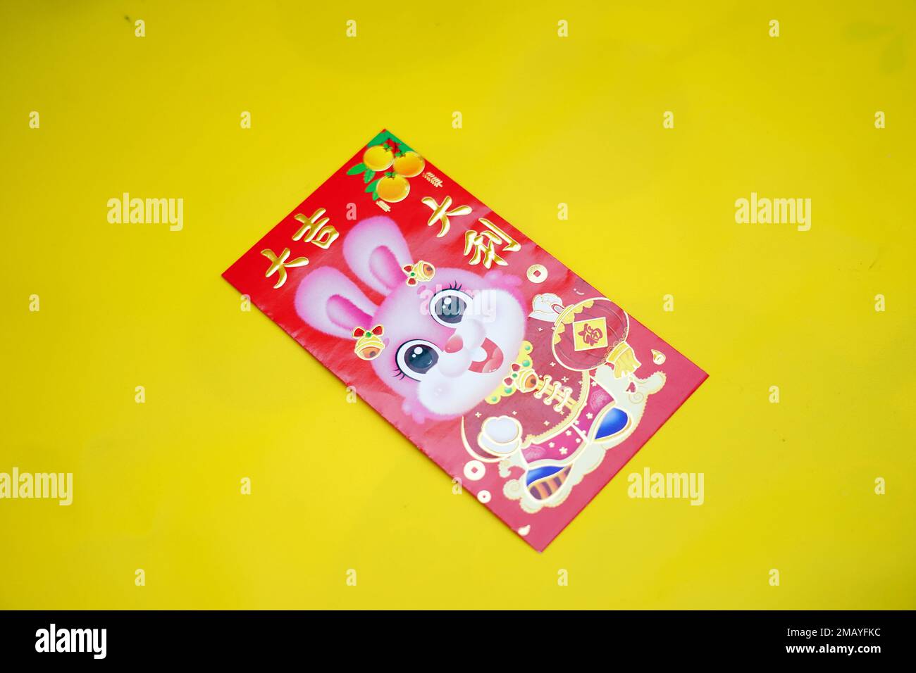Theme red envelopes with rabbit, Chinese blessing words on yellow ...
