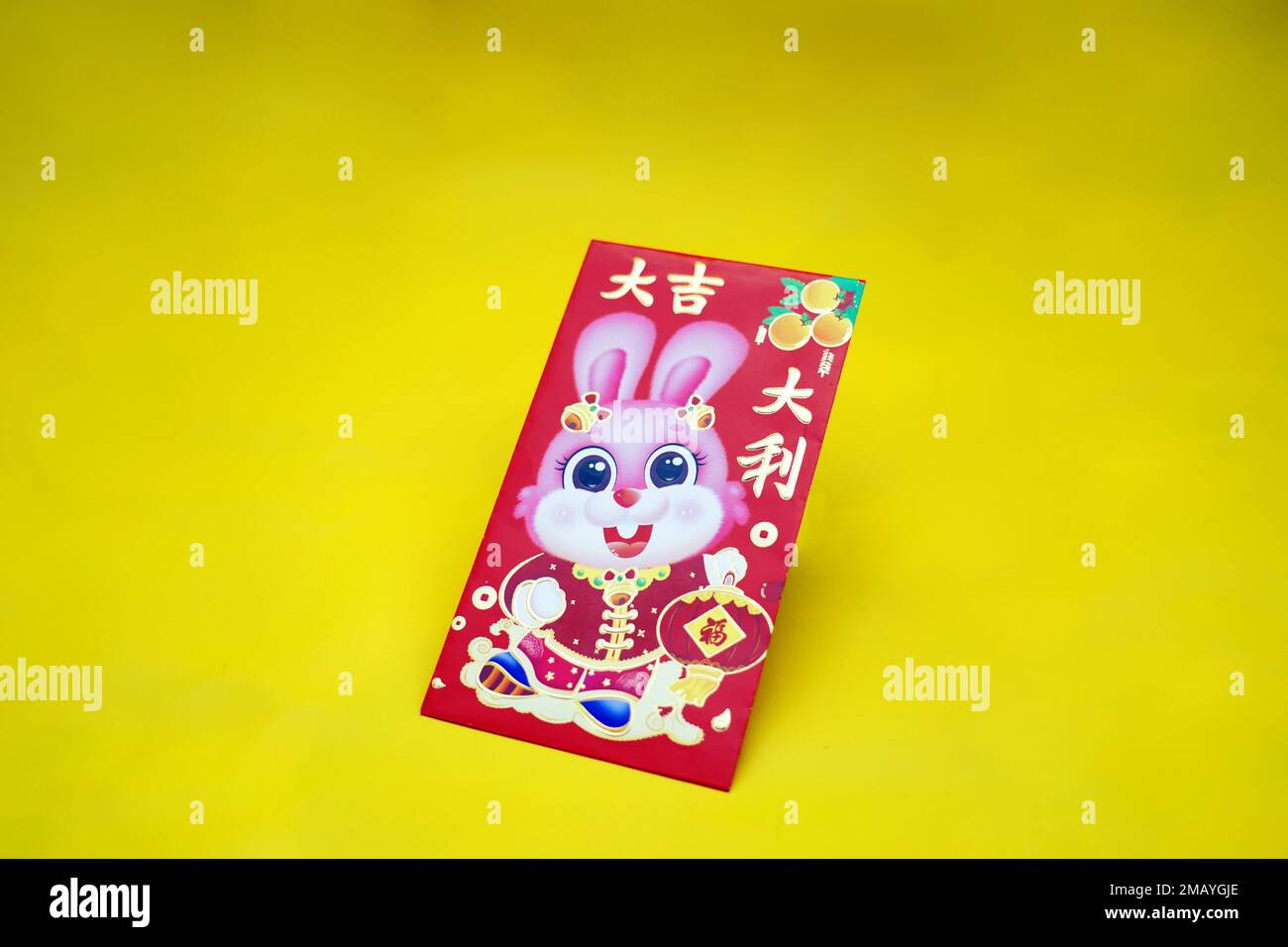 Theme red envelopes with rabbit, Chinese blessing words on yellow ...